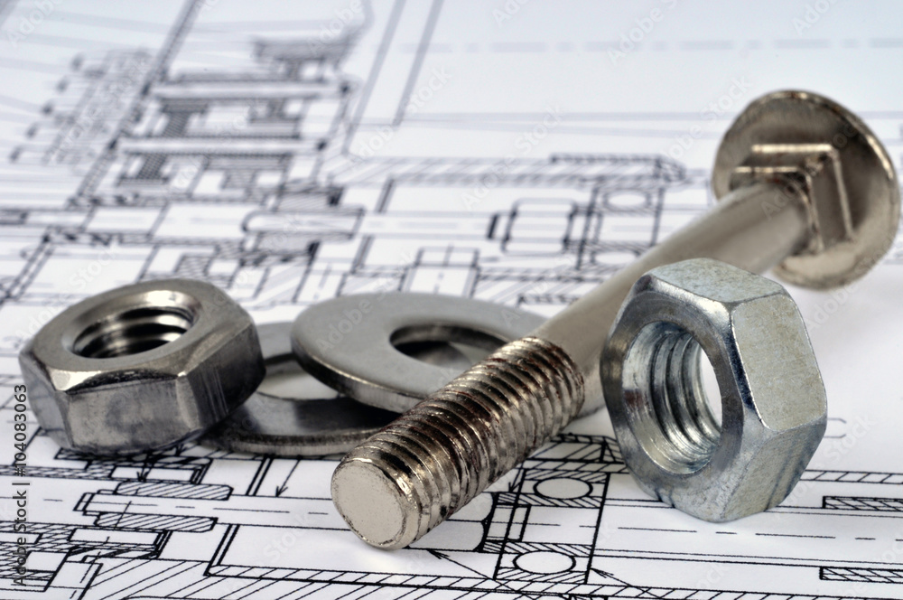 Boulon, écrous et rondelles posés sur un dessin industriel Stock 사진 ...