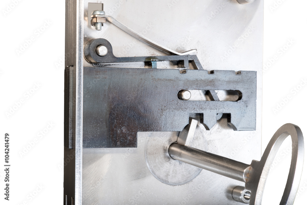 View of the inside mechanism of a basic door lock with the locking bolt ...