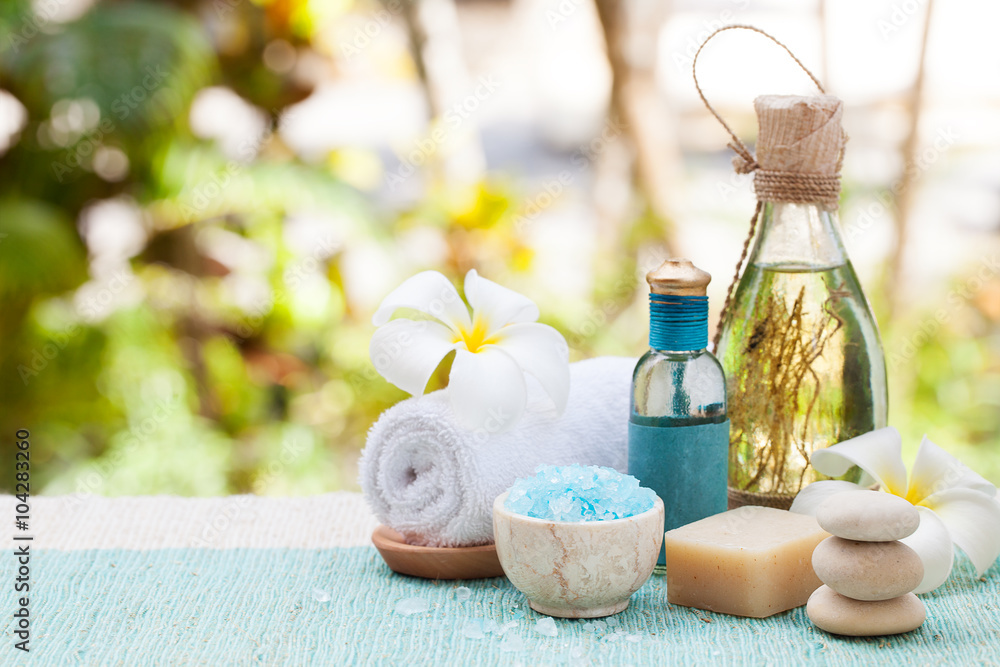 Spa and wellness massage setting Still life with essential oil, salt ...