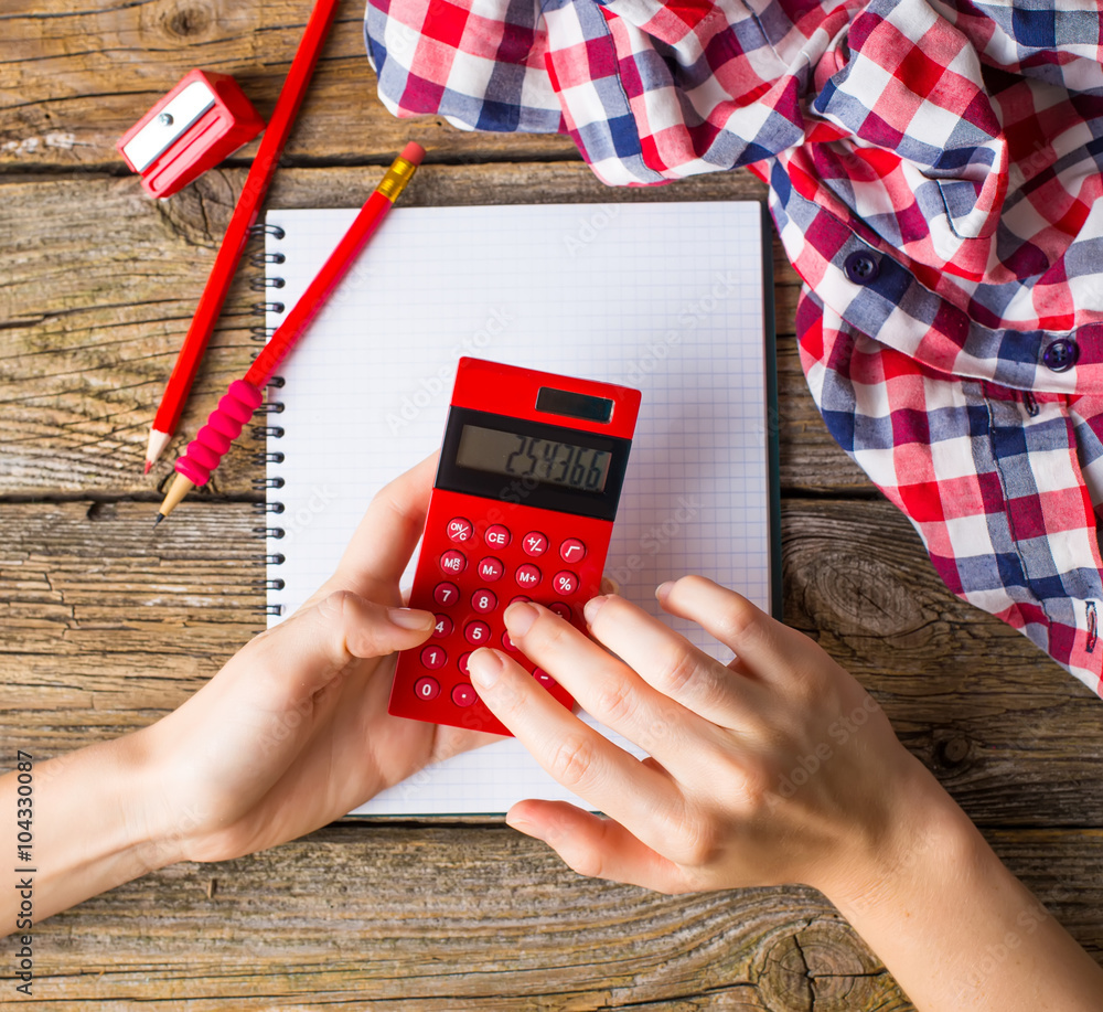 Desk with school supplies. Action hands during a lesson Stock Photo ...