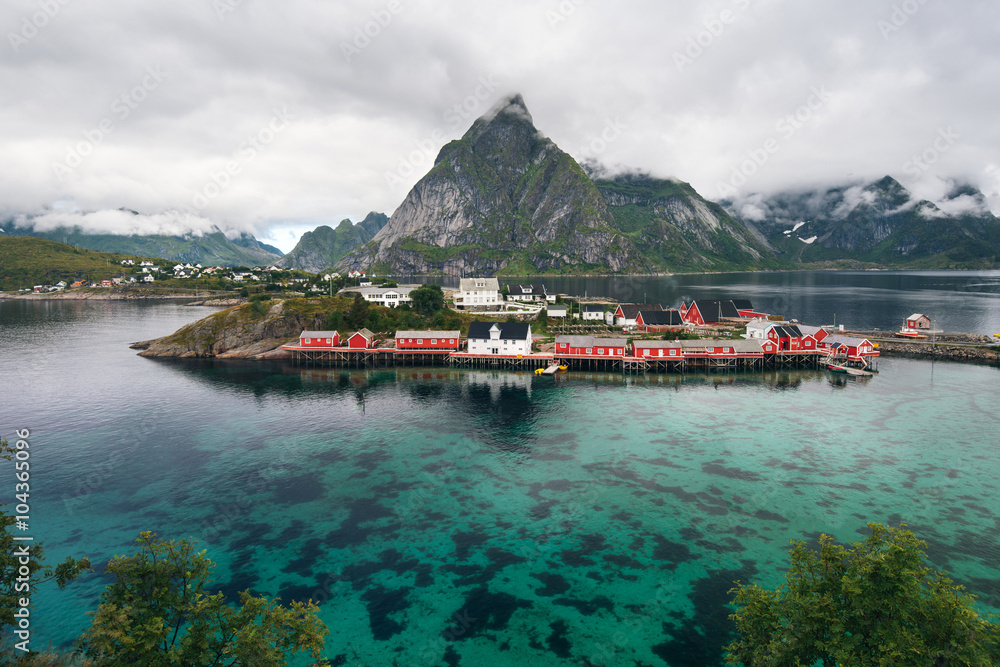 Scenic fjord on Lofoten islands with typical red fishing hut and ...