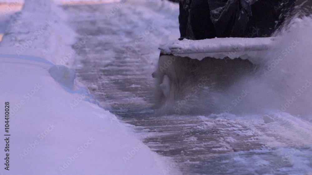 Vidéo Stock Snow removal with snow blower from pavement in flat house ...