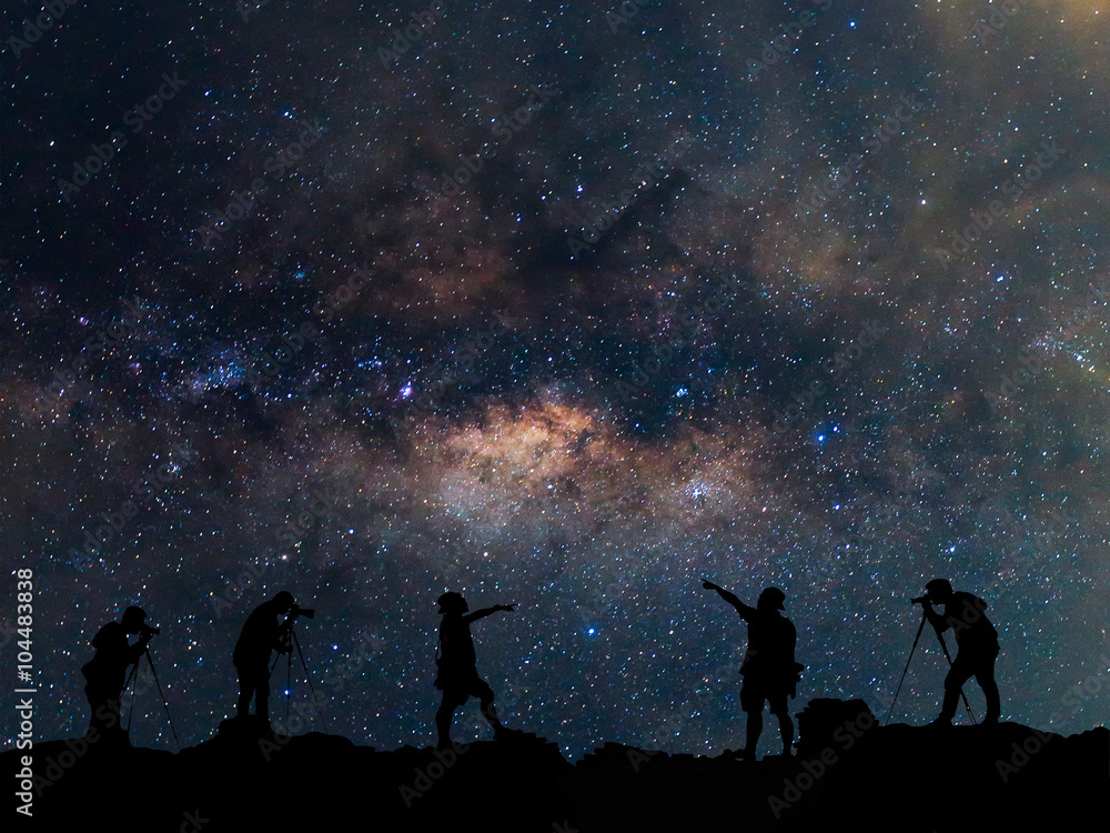 Star-catcher. A person is standing next to the Milky Way galaxy Stock ...