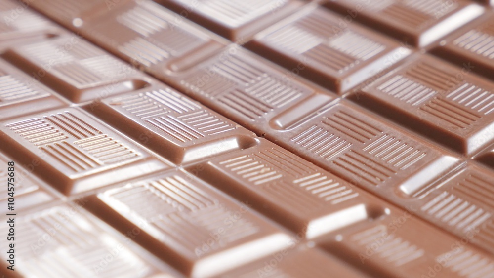 Shiny chocolate bars tasty confection shallow DOF tilting 4K 2160p ... Shiny chocolate bars tasty confection shallow DOF tilting 4K 2160p ...
