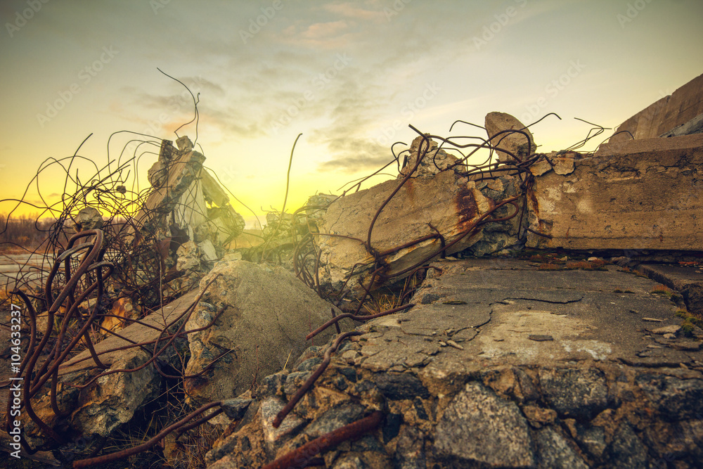 Old ruins of a building.The debris of the damaged building on sunset ...