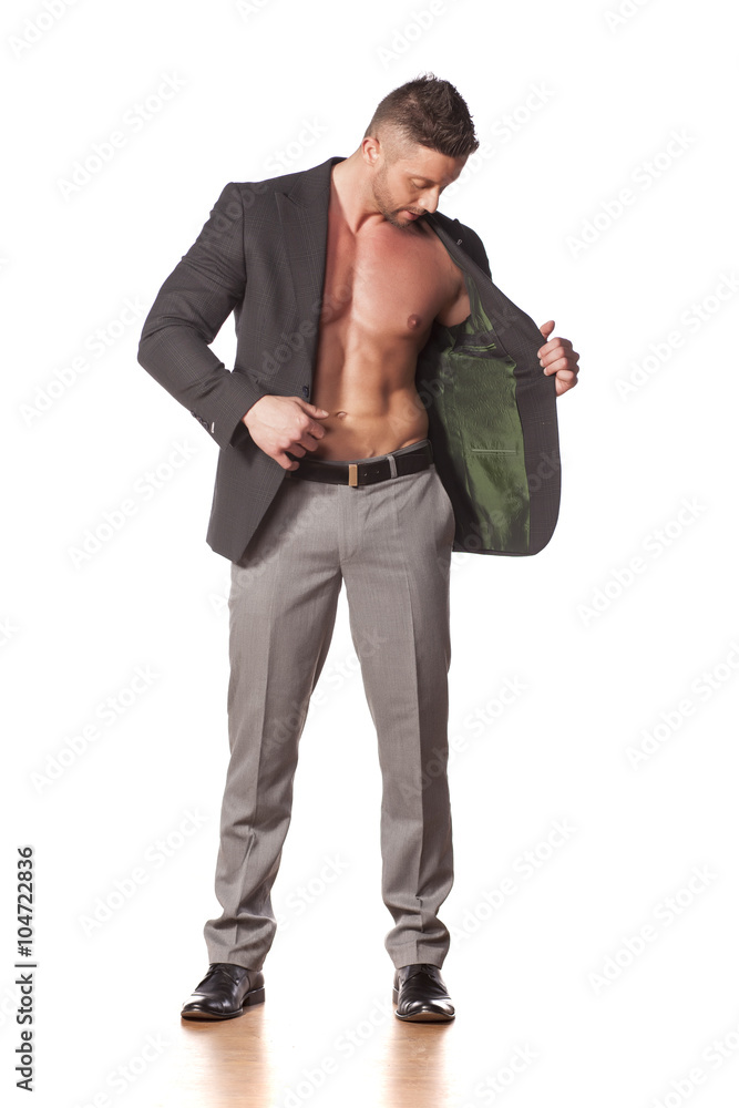 shirtless muscular man in a jacket and pants Stock Photo | Adobe Stock