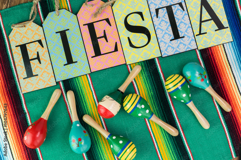 Mexican fiesta table decoration with colorful fiesta maracas and ...