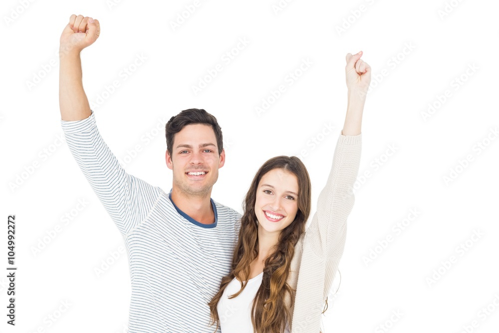 Triumphant couple raising fist Stock Photo | Adobe Stock