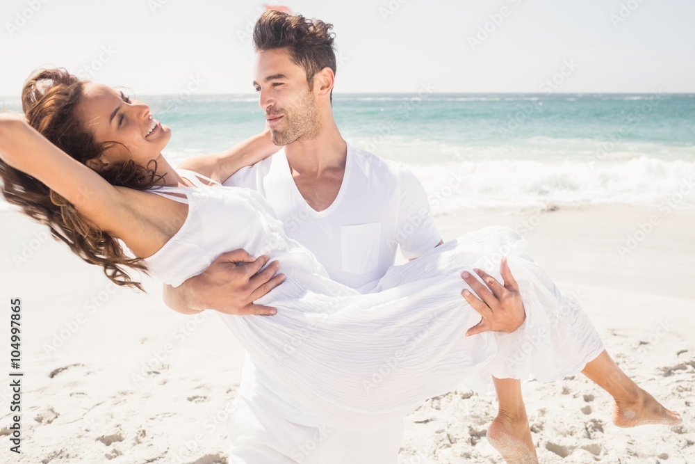 Boyfriend carrying his girlfriend Stock Photo | Adobe Stock