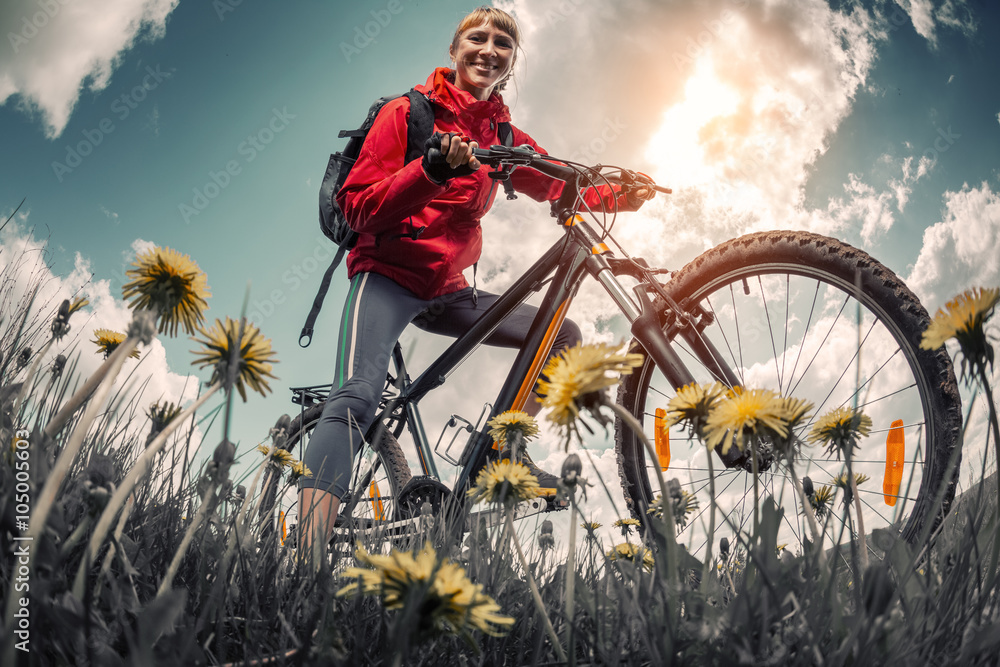 Lady with bicycle Stock Photo | Adobe Stock