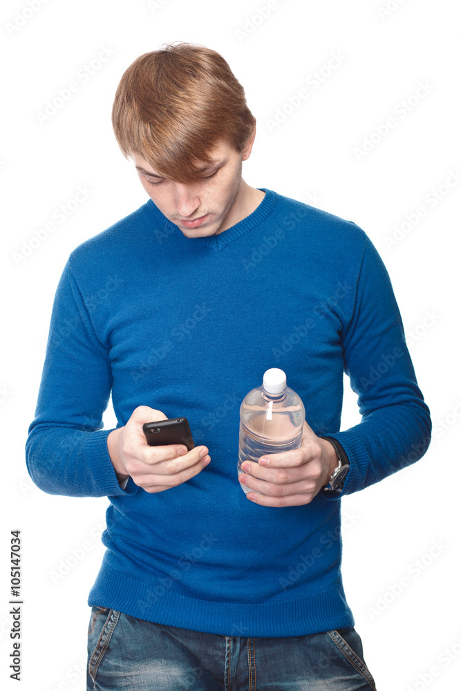portrait of a handsome young man with a water bottle over a white ...