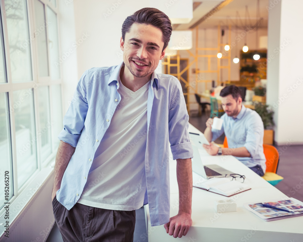 Handsome men working Stock Photo | Adobe Stock