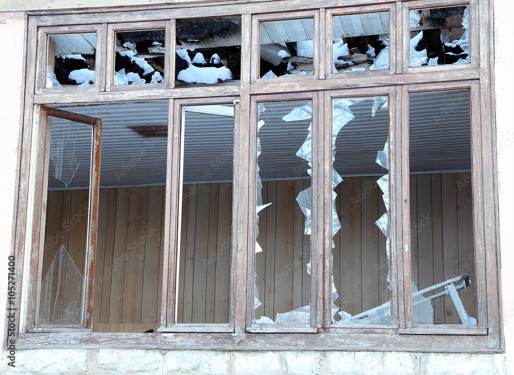 Broken Glass House Window