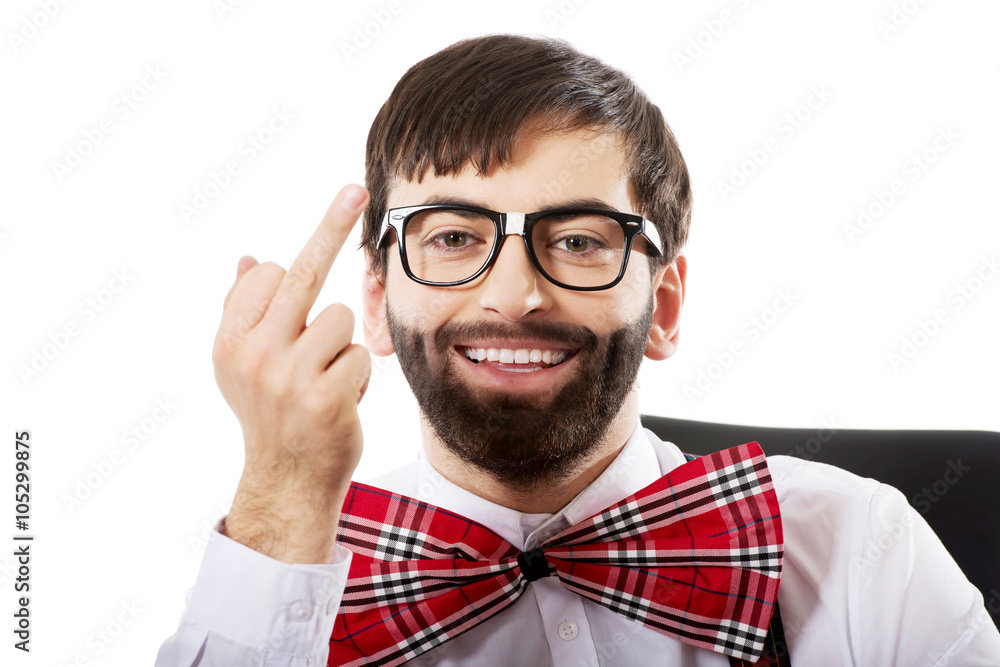 Young old fashioned man showing middle finger. Stock Photo | Adobe Stock