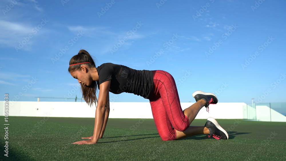 Bodyweight exercises - fitness woman doing fire hydrants legs kickbacks ...