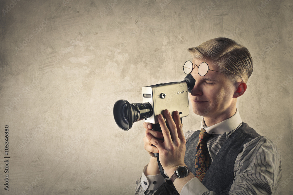 Man using an old-fashioned camera Stock Photo | Adobe Stock