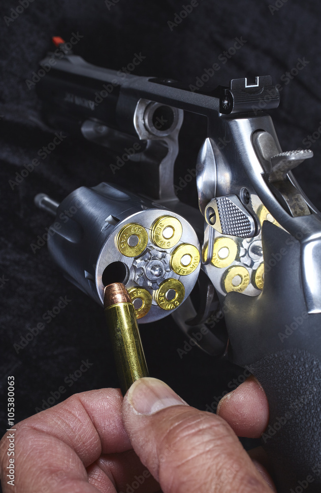 Man Loading Magnum Revolver Closeup Stock Photo | Adobe Stock