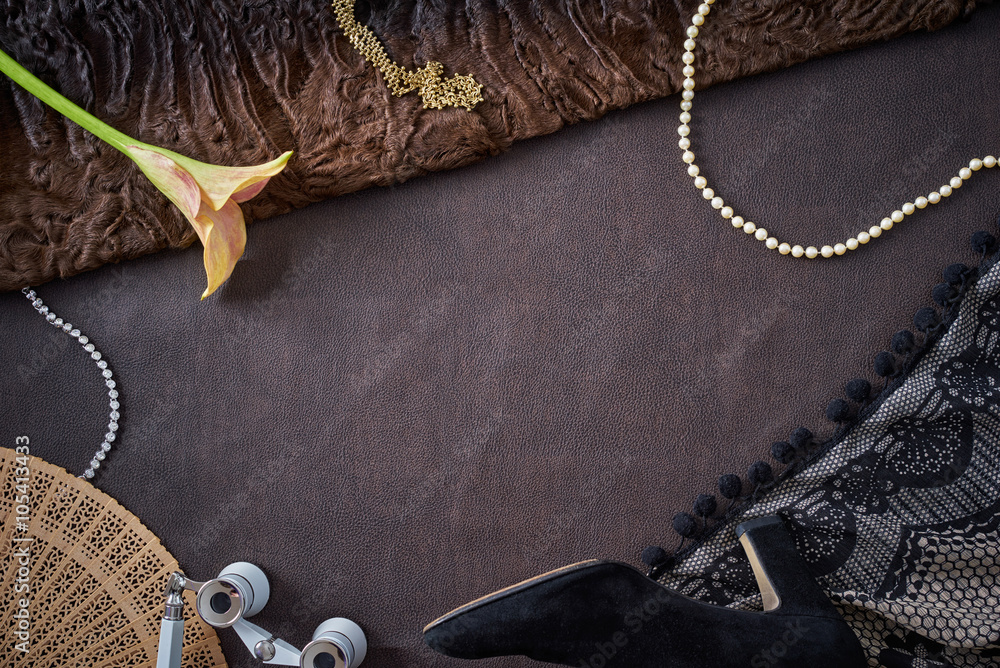 Overhead flat lay shot of feminine objects a woman uses in preparation ...