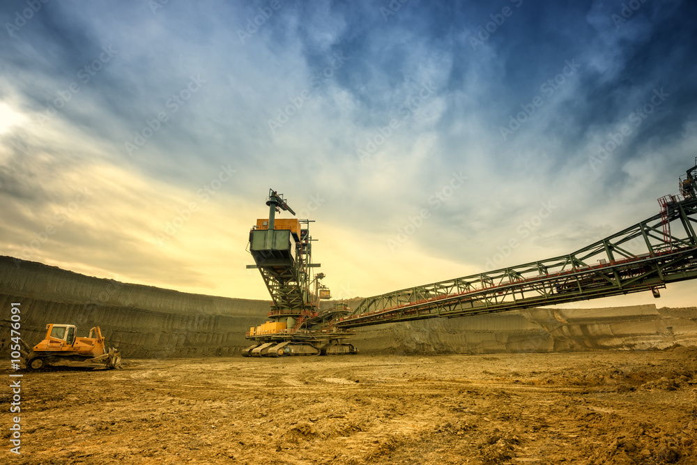 One side of huge mining drill machine and dredger photographed from a ...