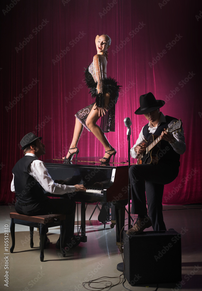 Girl dancing on the piano to the guitar and keys Stock Photo | Adobe Stock