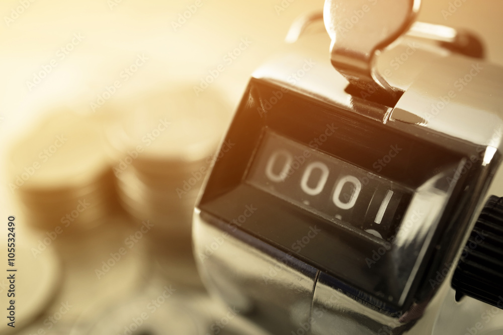 " time to start " headcount at number 1 on rows of coins background for ...