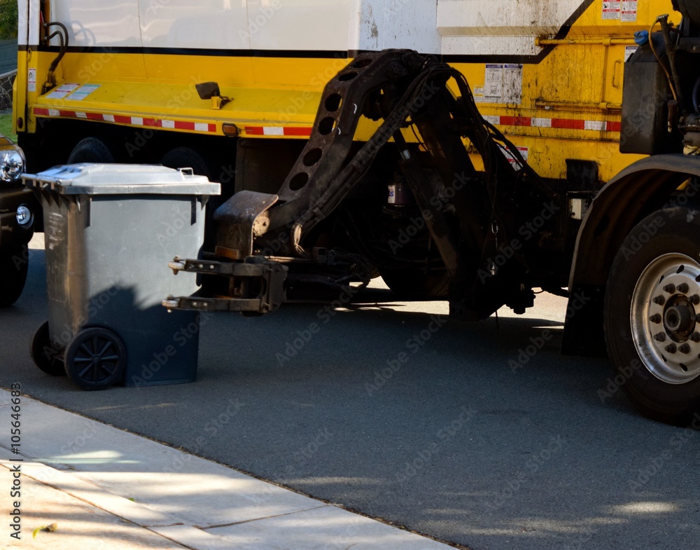 Garbage Day3 / Mechanical lifting arm grabbing the trash bin. Stock ...