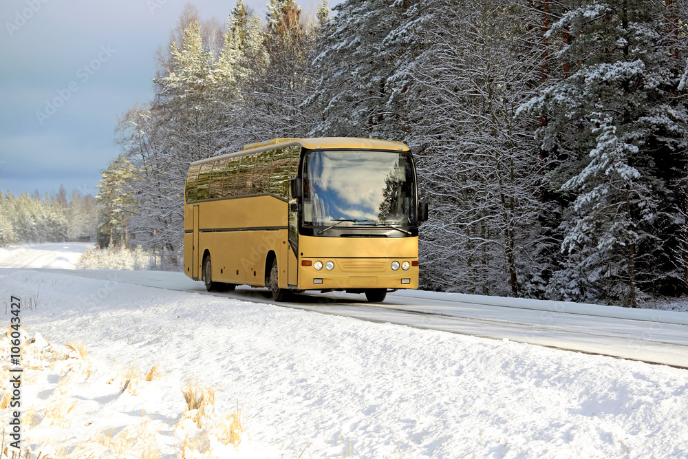 Yellow Bus on Winter Road Stock Photo | Adobe Stock