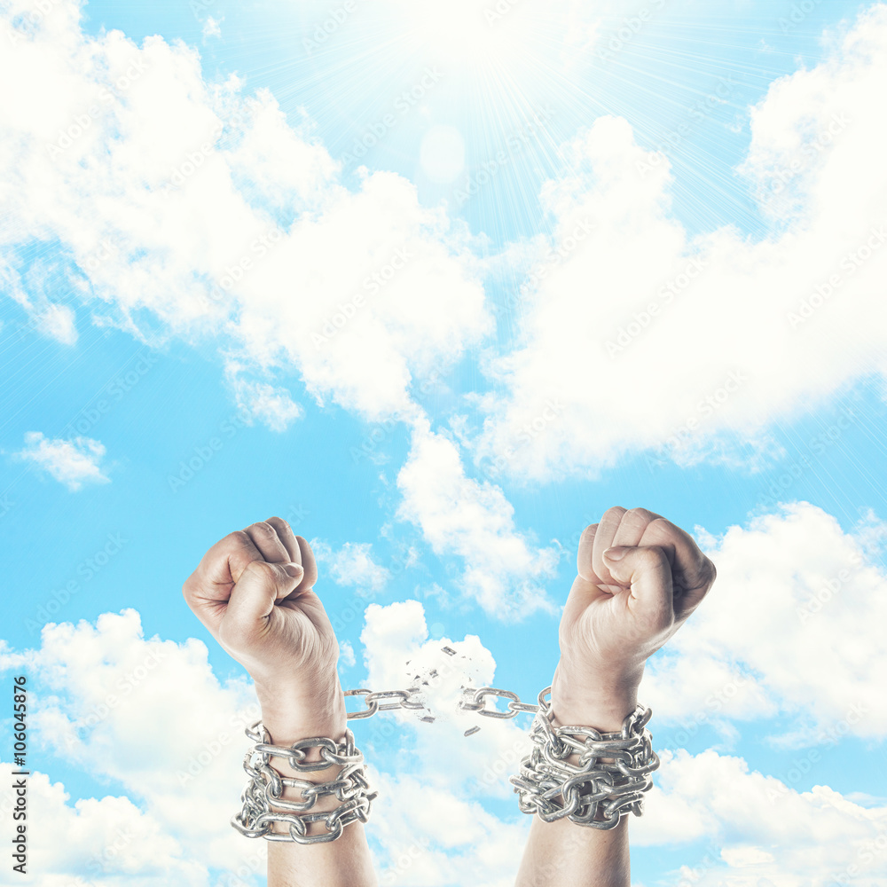 Two hands in chains Stock Photo | Adobe Stock