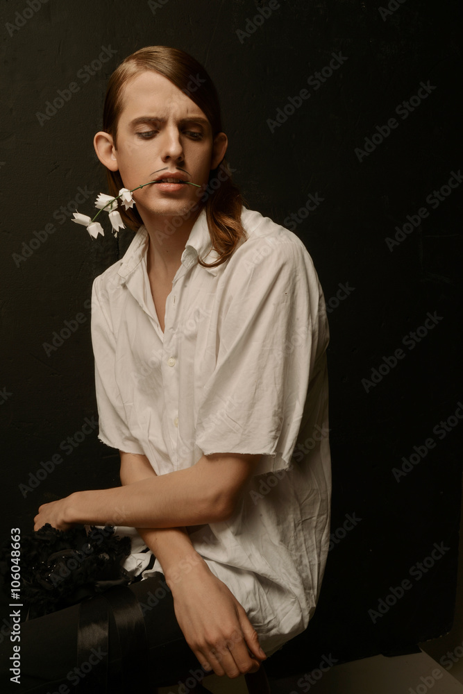 Young man at dramatic image Stock Photo | Adobe Stock