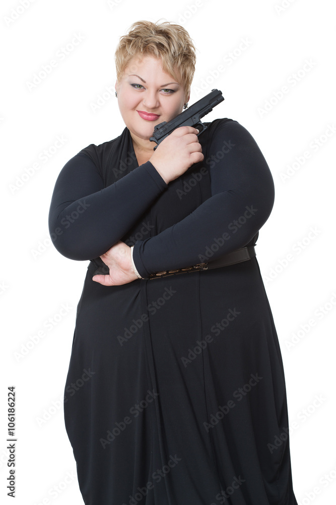 fat woman with a gun. Stock Photo | Adobe Stock
