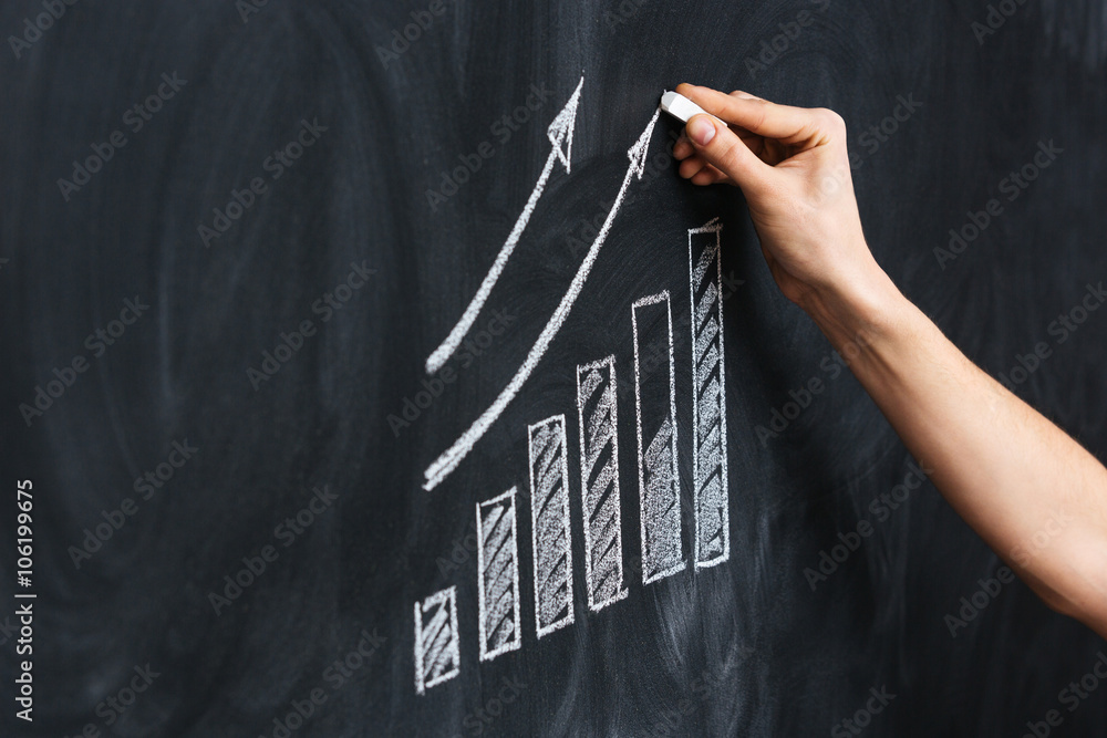 Hand drawing growth chart on blackboard Stock Photo | Adobe Stock