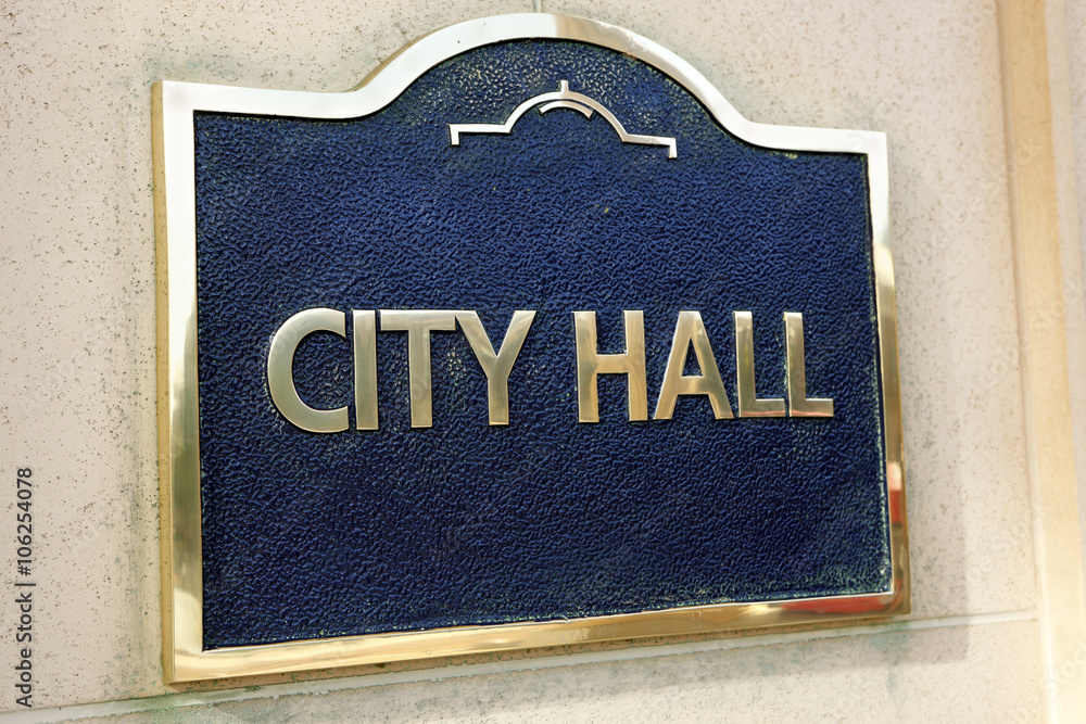 City Hall sign on the front of a local government building photo Stock ...
