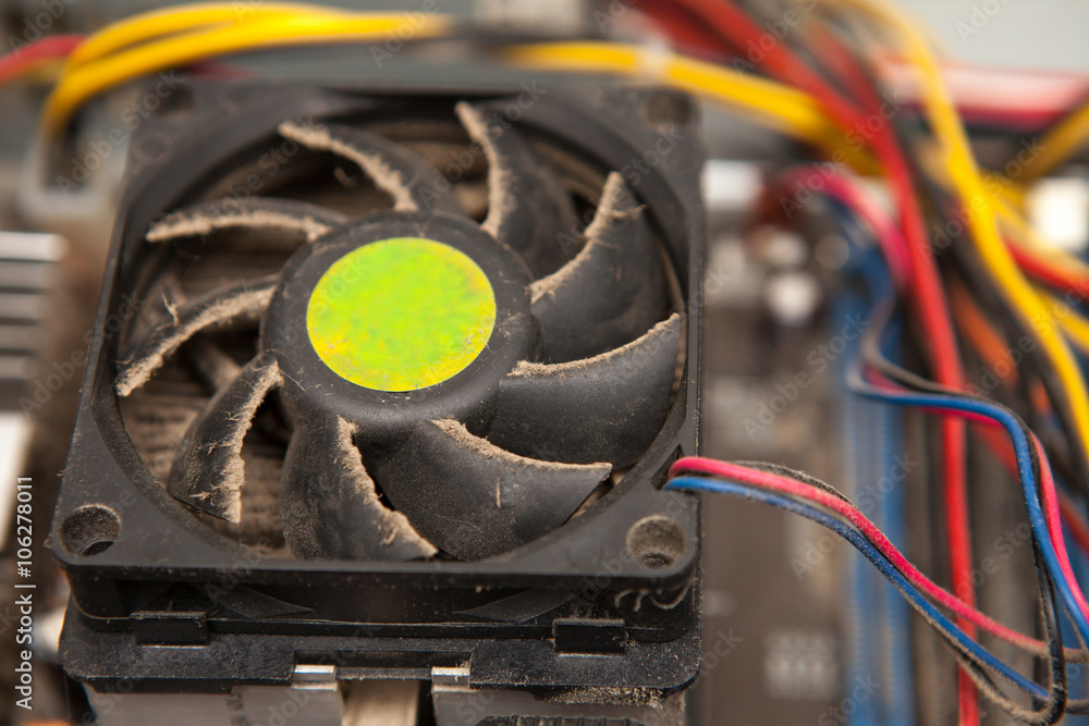 Disassembled computer. Dusty cooler and motherboard. Shallow dep Stock ...