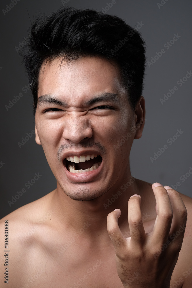 Asian man portrait with no makeup show his real skin in grey background ...