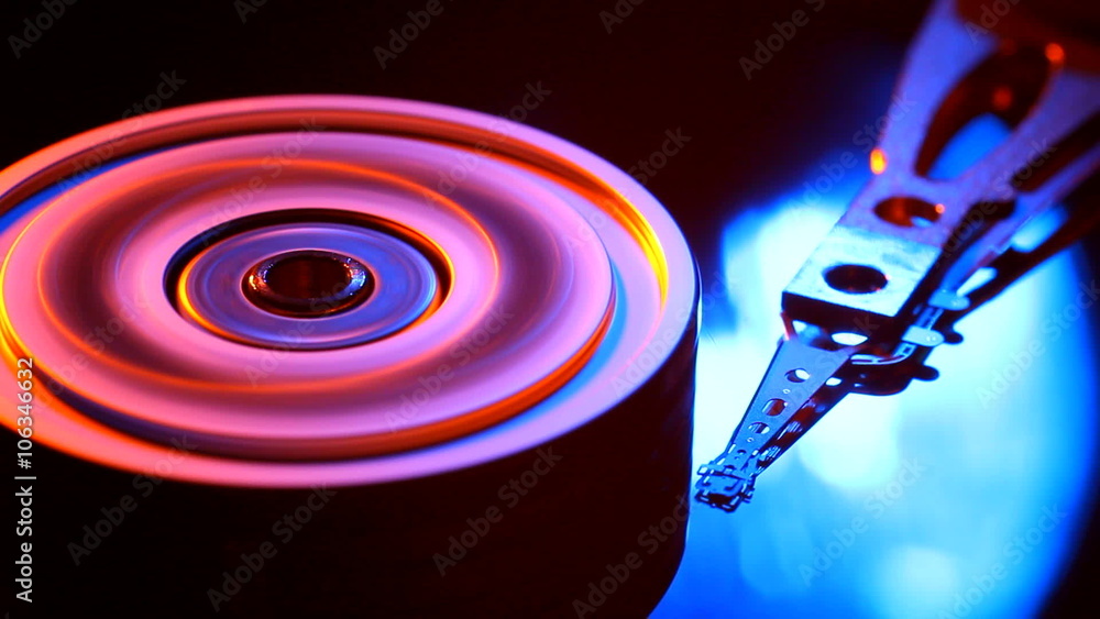 Computer hard drive disc start up spin and stop with moving actuator ...