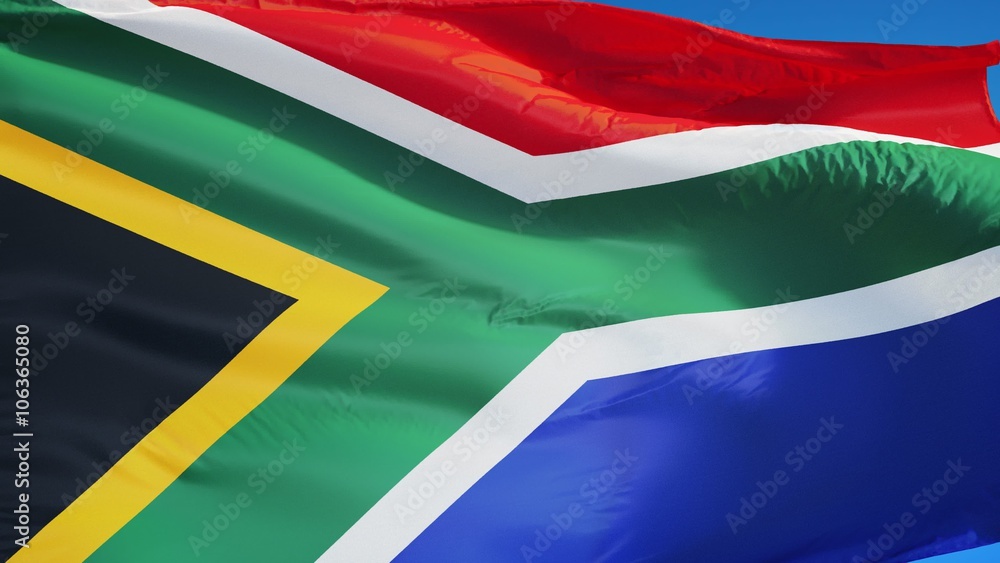 South Africa Flag Waving In Slow Motion Against Clean Blue Sky