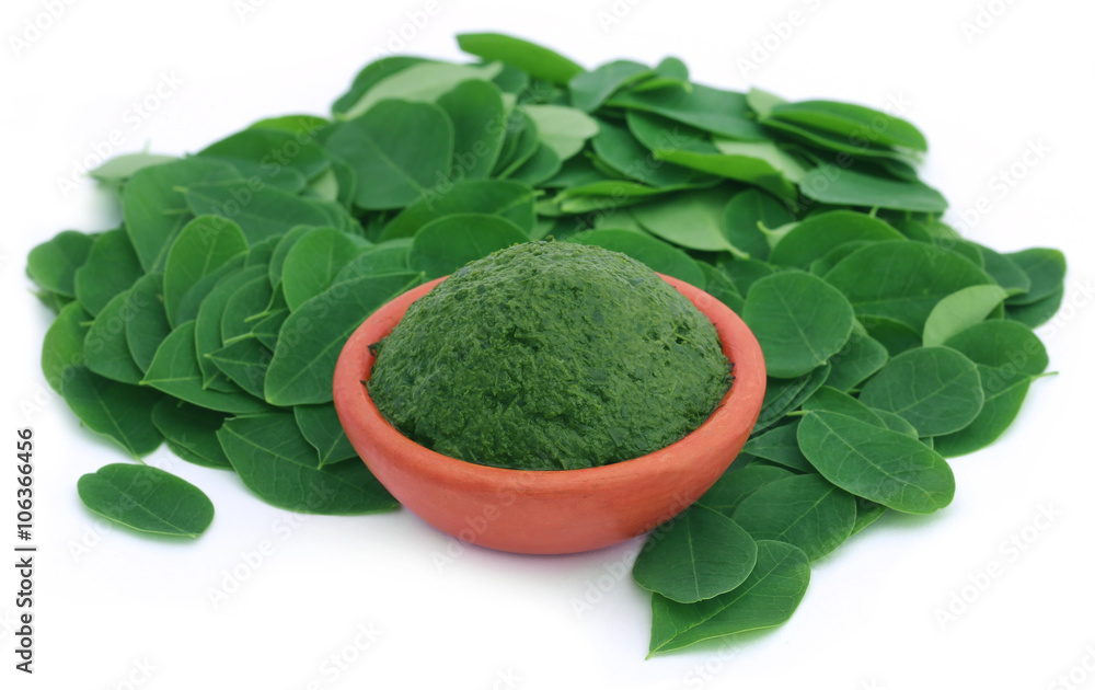 Edible moringa leaves with ground paste Stock Photo | Adobe Stock