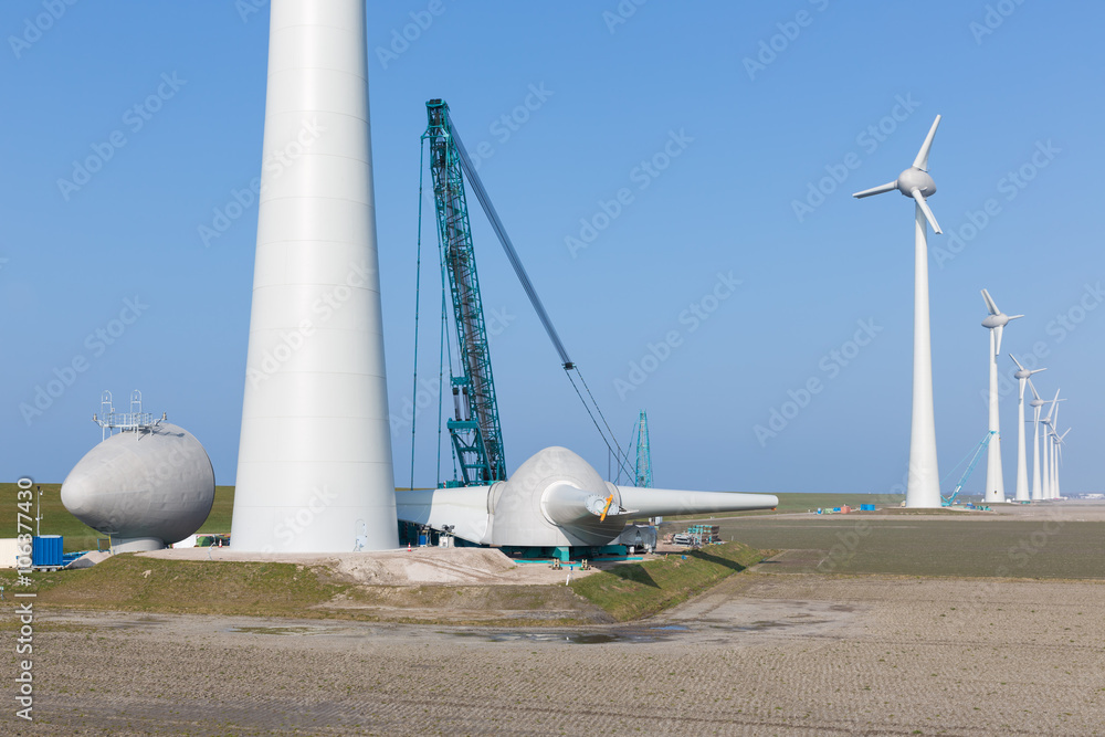 Dutch farmland with construction site ner wind turbines Stock Photo ...