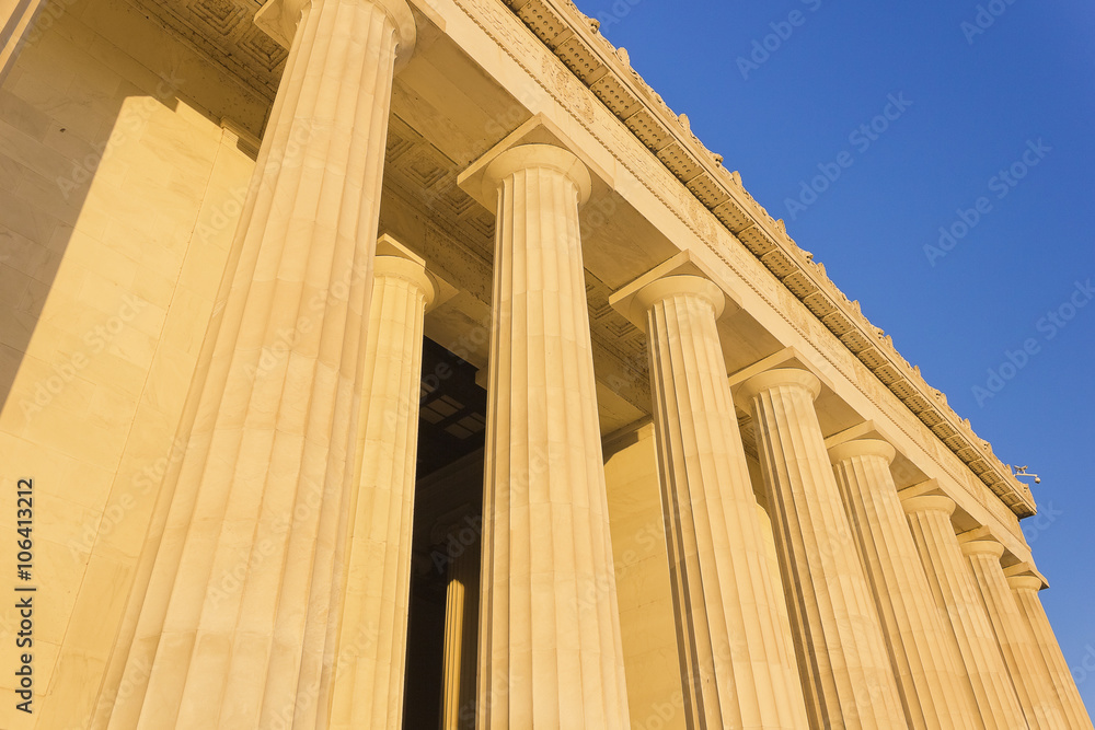 Morning sunshine covering the colossal Doric order columns of the ...