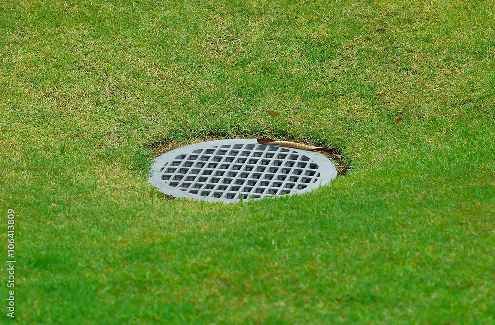 Drain on the golf course Stock Photo | Adobe Stock
