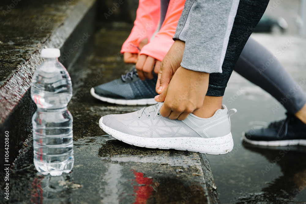 Urban running and fitness workout outdoor under the rain concept ...