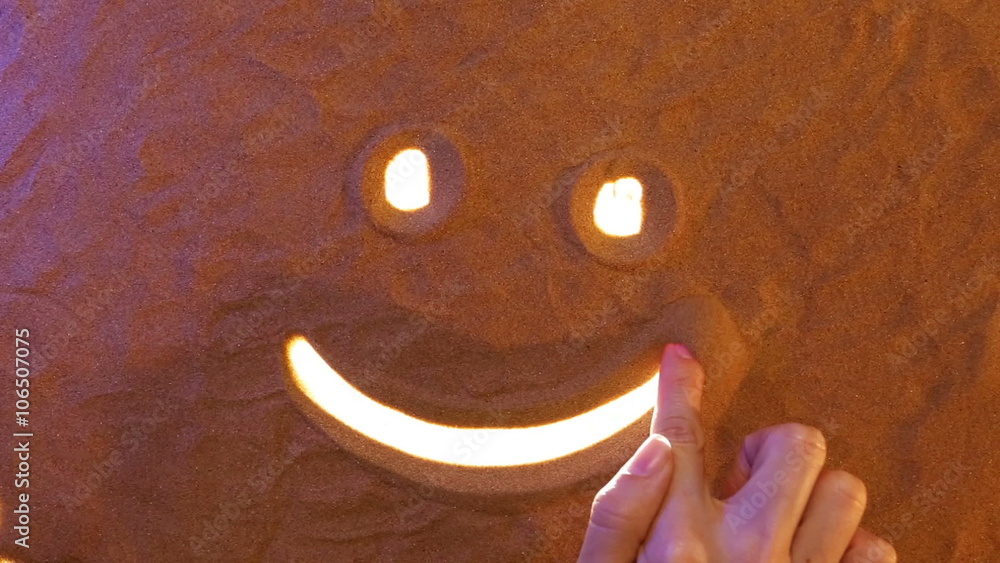 Video Stock Hand drawing Smile Symbol in the Sand. Beach background ...