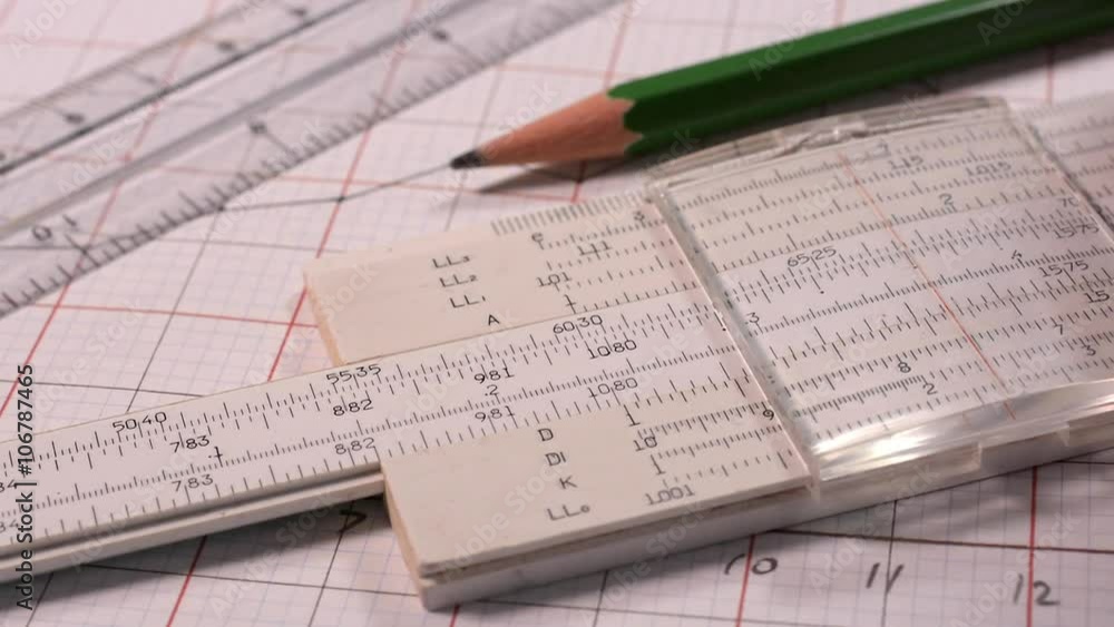 Using an old slide rule to make calculations in the construction of a ...