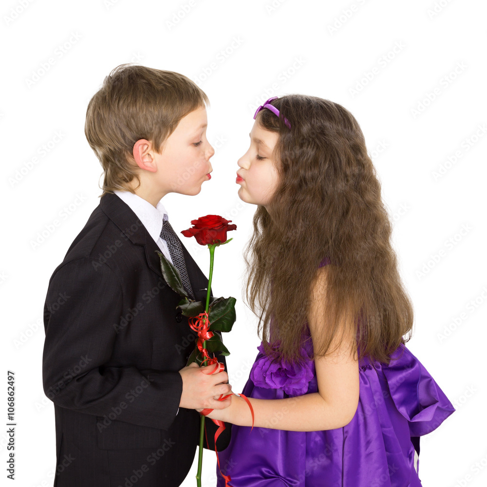 Kids love concept. Little boy and girl kissing Stock Photo | Adobe Stock