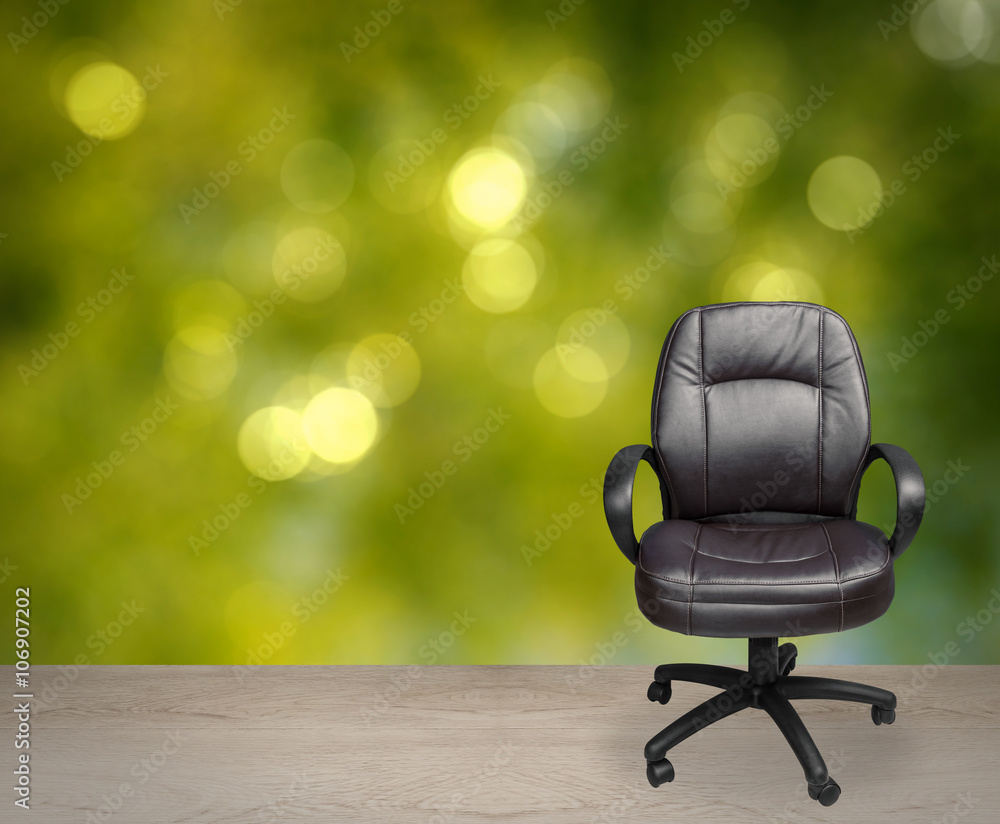 office chair on green background Stock Photo | Adobe Stock