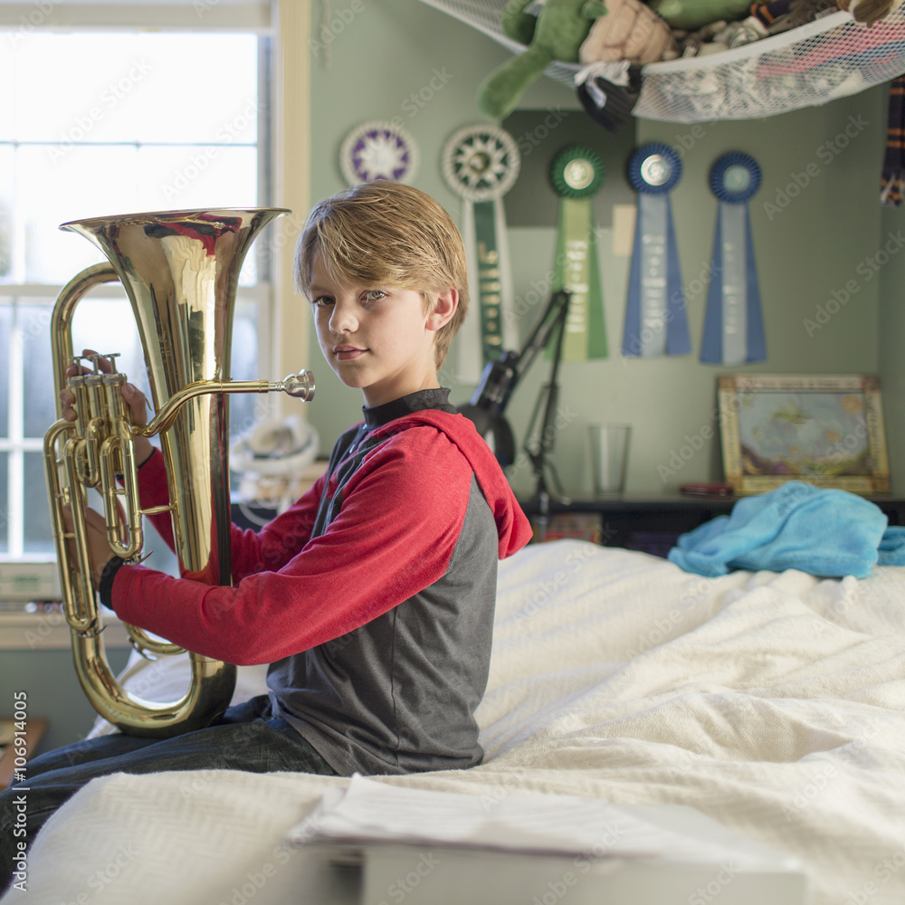 Boy with tuba Stock Photo | Adobe Stock