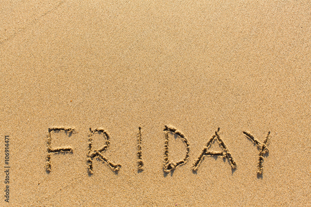 Friday - written manually on the texture of sea sand. Stock Photo ...
