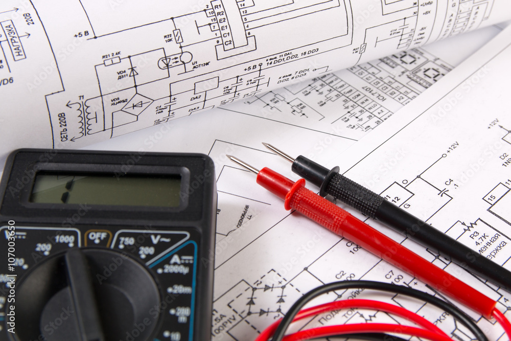 electrical engineering drawings and digital multimeter Stock Photo ...