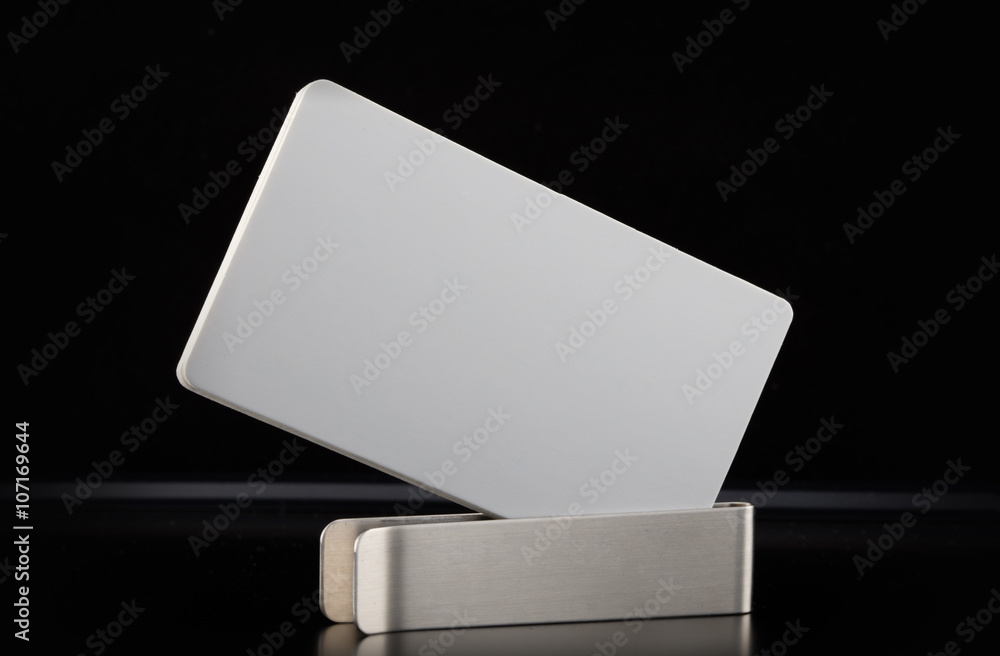 Mockup business template visit card in card holder on black background ...