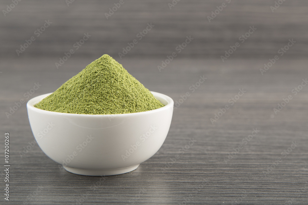 Moringa powder - medicinal plant. Stock Photo | Adobe Stock